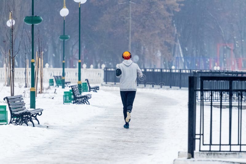 Man Jogging in Winter Park, Healthy Lifestyle Stock Image - Image of ...