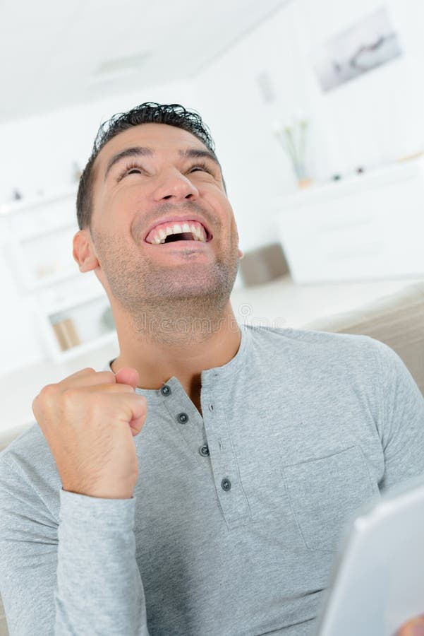 Man jubilant winner stock image. Image of victory, laughter - 250315929