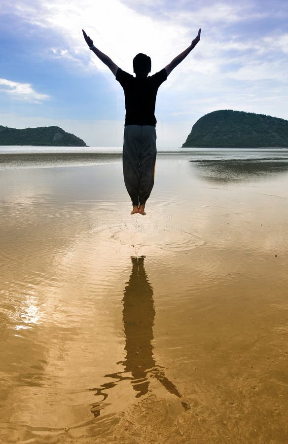 Man jump on beach stock photo. Image of courage, outdoor - 25666704