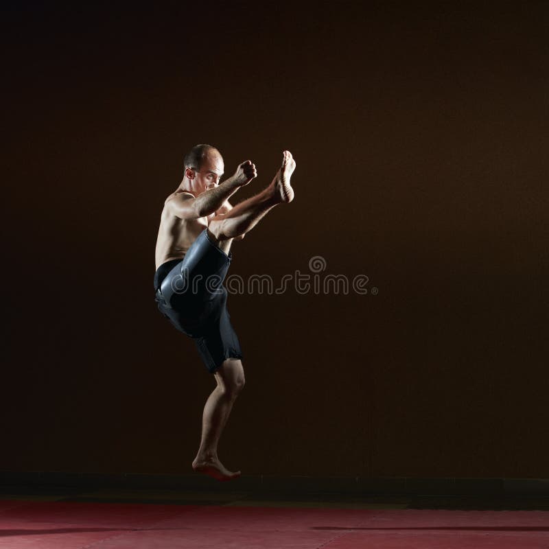 The Man in the Jump Beats the Kick Stock Image - Image of self, fight ...