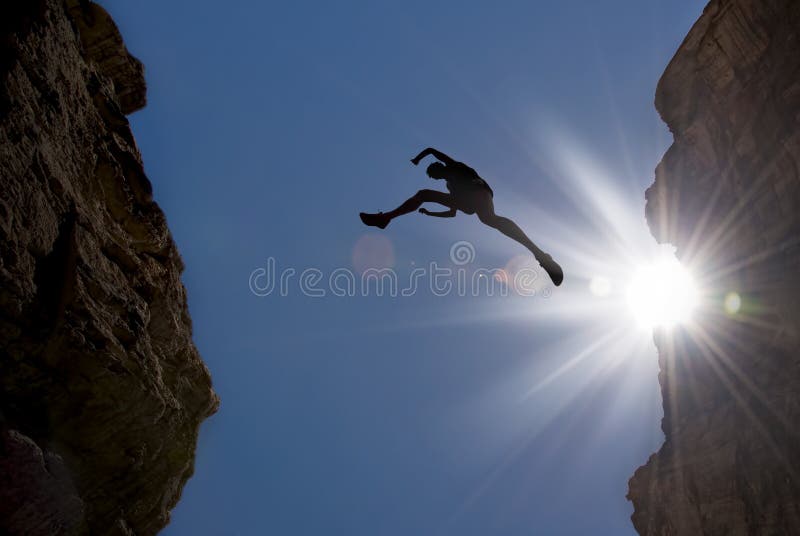 Man Jump through the Gap in the Mountain Stock Image - Image of goal ...
