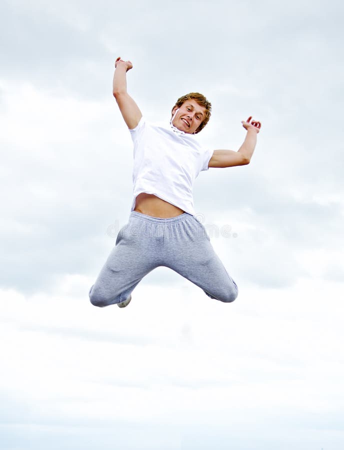 Man Jumping in Air Against Sky. Stock Image - Image of lifestyle ...