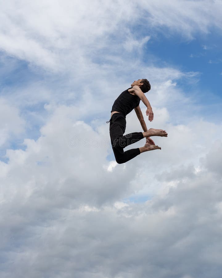Man jumping in the air stock image. Image of skymale - 263973935