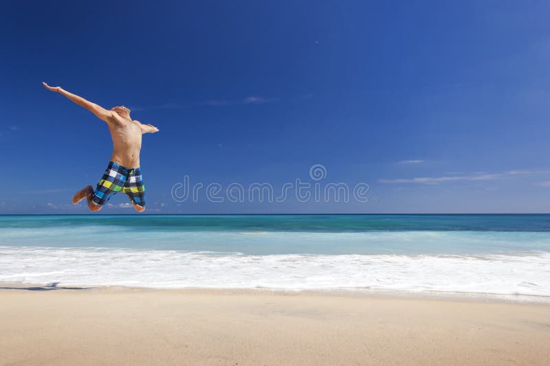 Jumping in the beach stock image. Image of jumping, beach - 36229291