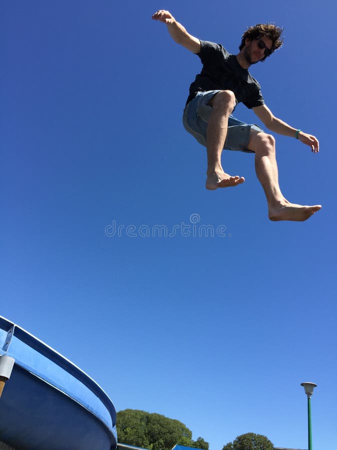 Man jumping editorial stock photo. Image of jumping, blue - 49180308