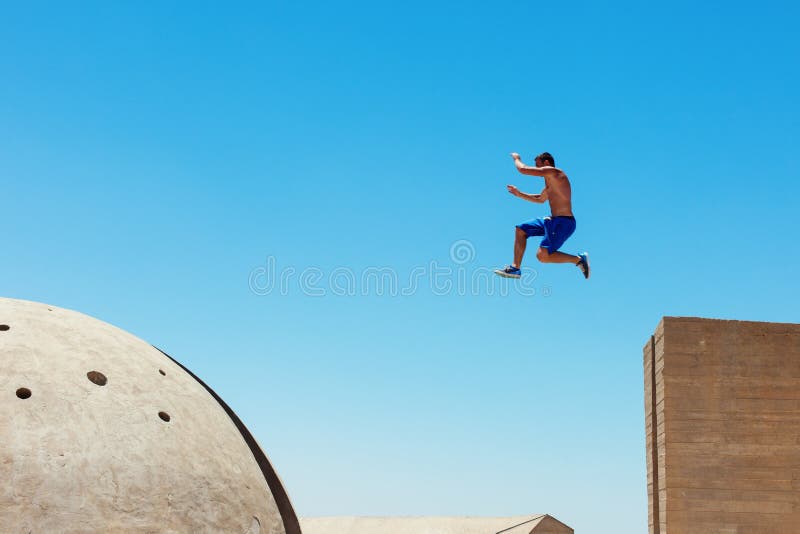 Two Brave Men Jumping Over the Roof Stock Photo - Image of athlete ...