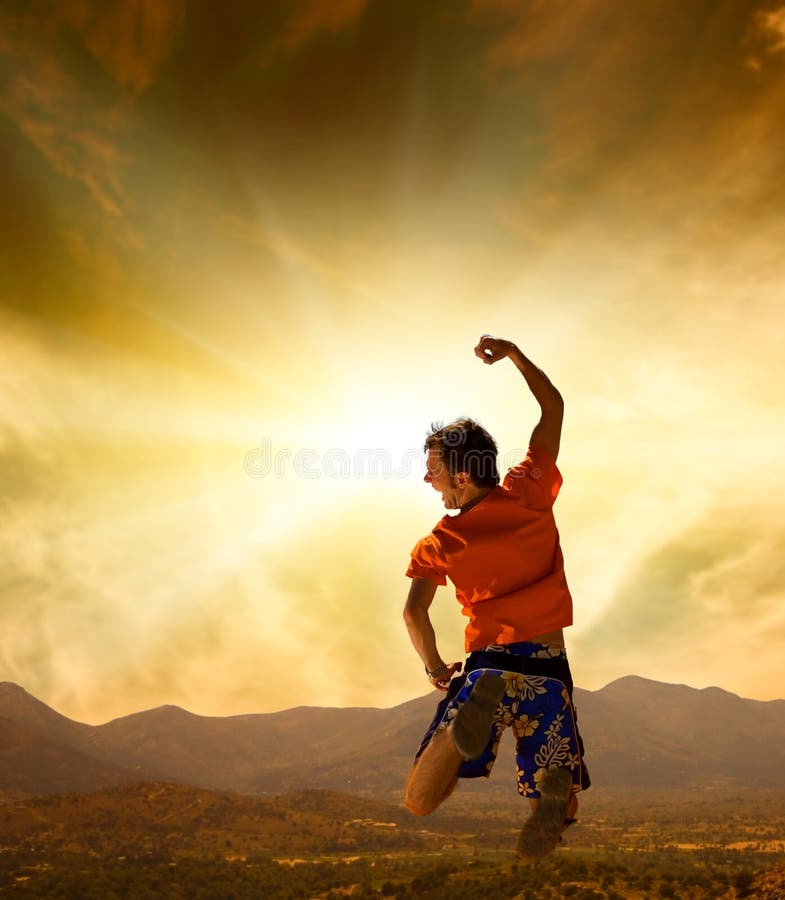Man jumping in mountains stock image. Image of energy - 8646345