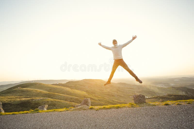 Man jumping stock photo. Image of happy, cliff, power - 66791470