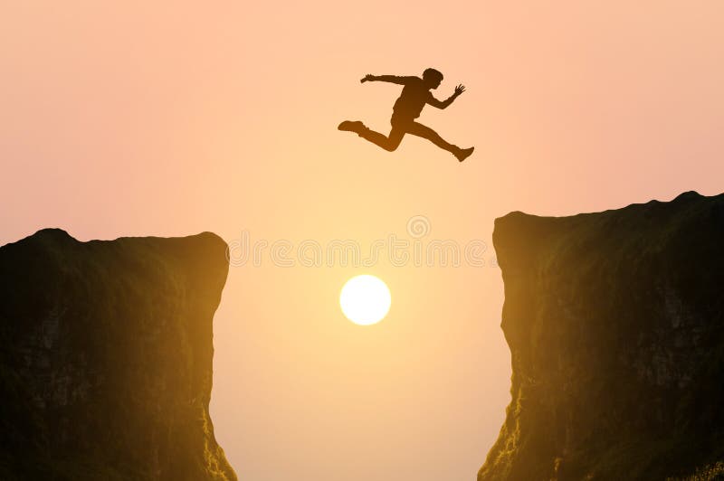 Man Jumping Over the Cliff, Silhouette Stock Image - Image of canyon ...