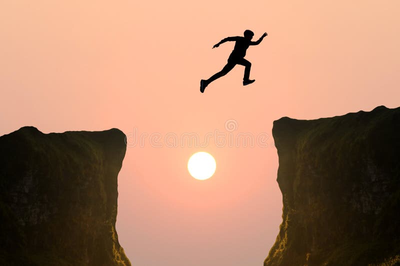 Man Jumping Over the Cliff, Silhouette Stock Photo - Image of mountain ...