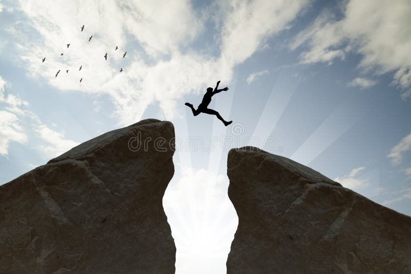 Man jumping over rocks stock photo. Image of eyes, happiness - 52864730