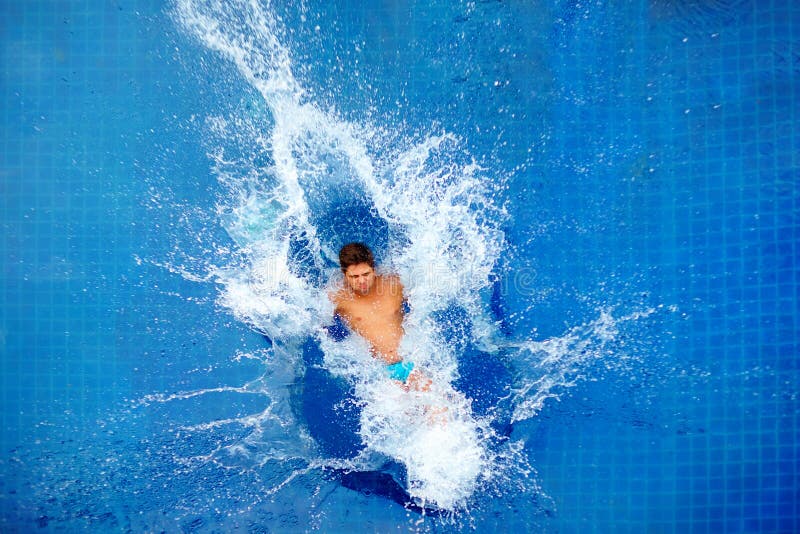 Man Jumping in Pool, Huge Splash, Top View Stock Photo - Image of ...