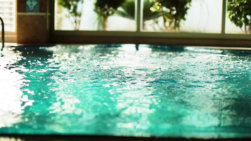 Man Jumping into a Pool, Indoor, Side View. Stock Video - Video of ...