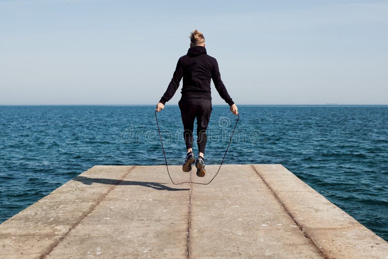 Man Jumping Rope on Seaside Stock Image - Image of outdoors, fitness ...