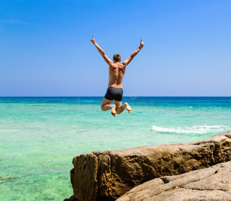 Man jumping in the sea stock image. Image of fall, risk - 31749077
