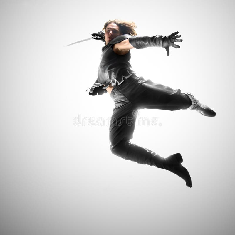 Man Jumping with a Sword, Attack Stock Photo - Image of domination ...