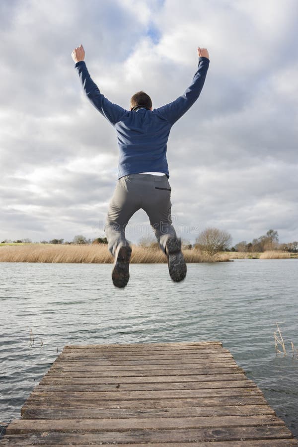 Man Jumping stock photo. Image of jumpsuit, adventure - 39020374