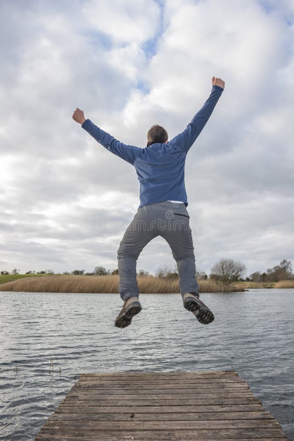 Man Jumping stock photo. Image of lifestyle, adventure - 39326046