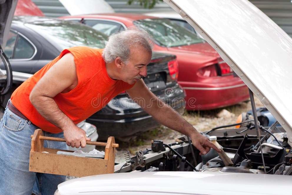 Man Junk Yard Hunting stock image. Image of salvage, shopping - 22695569