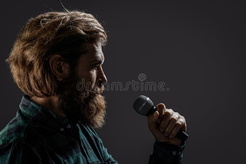 Man Karaoke Singer. Bearded Man Singing with Microphone Stock Photo ...