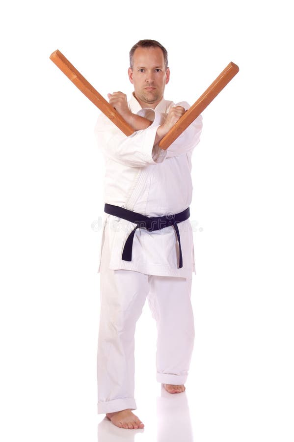 Man with tonfa stock photo. Image of belt, fighter, arts - 29850348