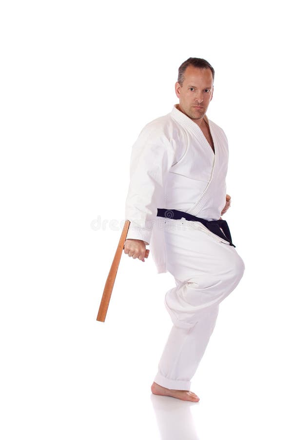 Man with two tonfa stock photo. Image of athlete, black - 29850080