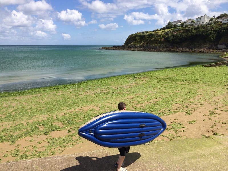 Man with Kayak on Cornish Beach Editorial Stock Image - Image of kayak ...