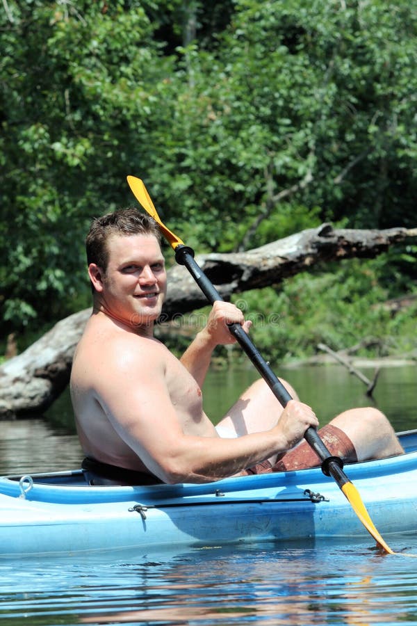 Man kayaking stock photo. Image of people, life, pond - 25019090