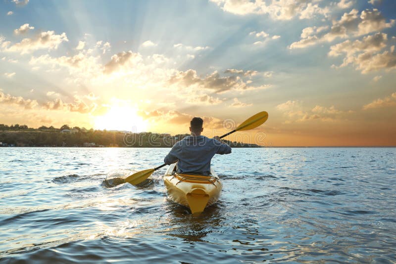 Man Kayaking on River at Sunset, Back View. Summer Activity Stock Photo ...