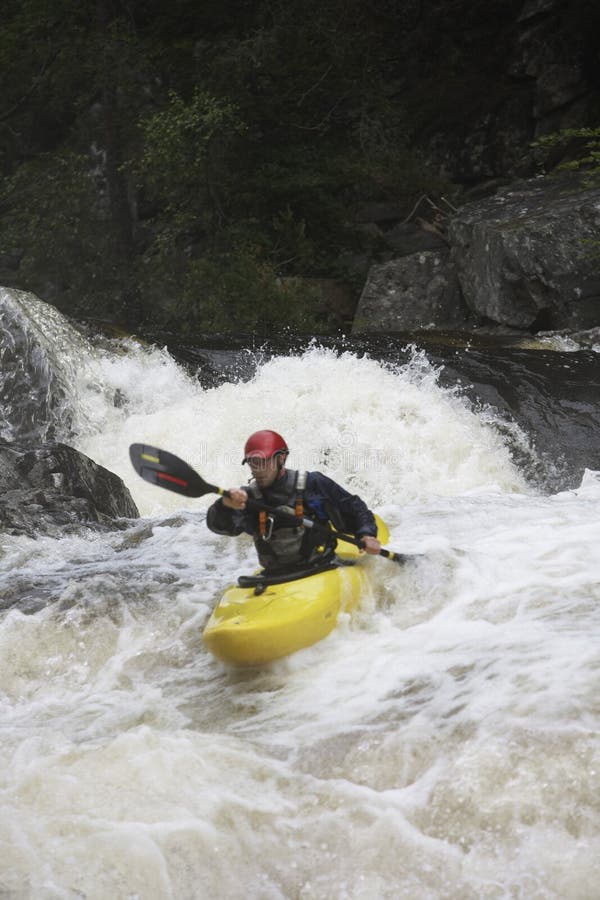 Man kayaking in river stock photo. Image of adventure - 33890022