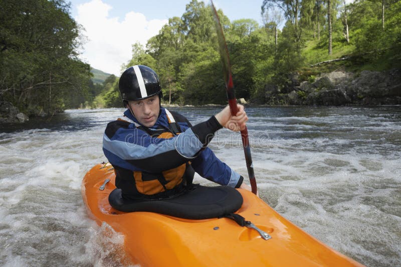 Man kayaking in river stock image. Image of caucasian - 33900653