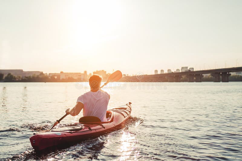 Man kayaking on sunset stock image. Image of kayak, caucasian - 97892917