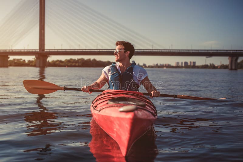 Man kayaking on sunset stock image. Image of enjoy, adventure - 97893343