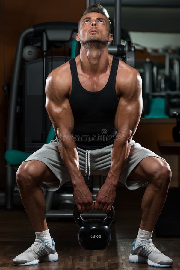 Man and Kettle Bell stock image. Image of abdominal, fitness - 41166493