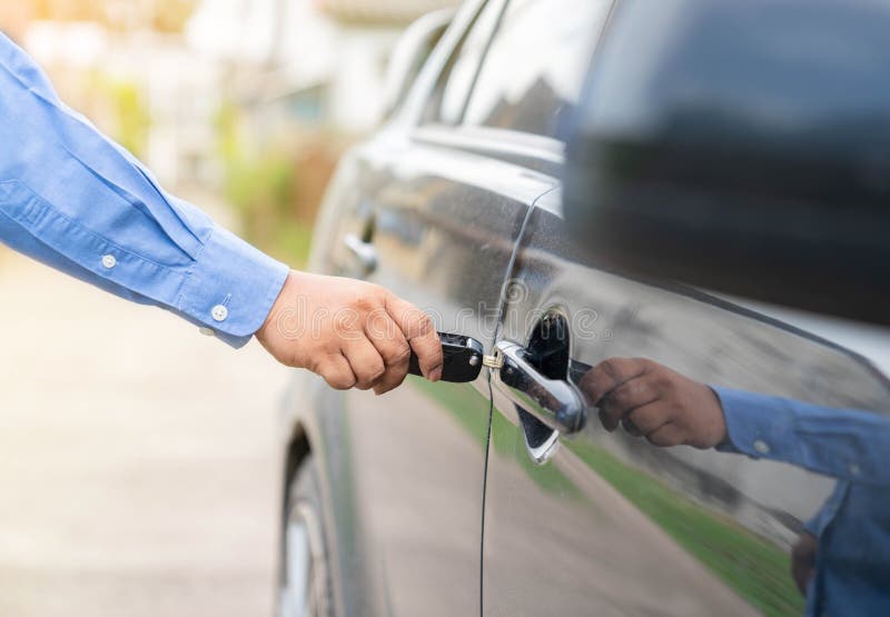 The Man Key Unlock Car for Drive Go To Work in the Morning Stock Photo ...