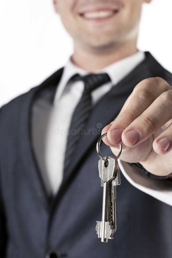 Business Man Giving You the Keys To a Home Stock Photo - Image of ...