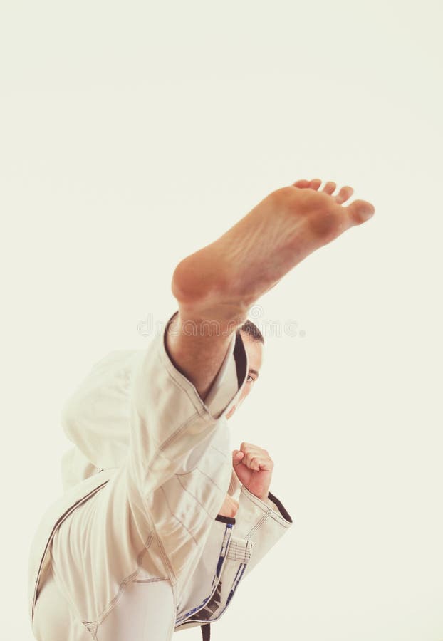 Man in Kimono Beat a High Leg Kick Stock Photo - Image of fighting ...