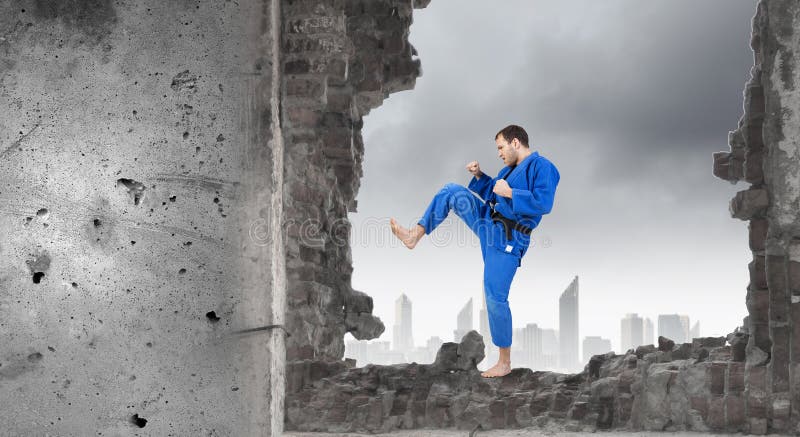 Man in Kimono Breaking Wall Stock Image - Image of wear, power: 72539021