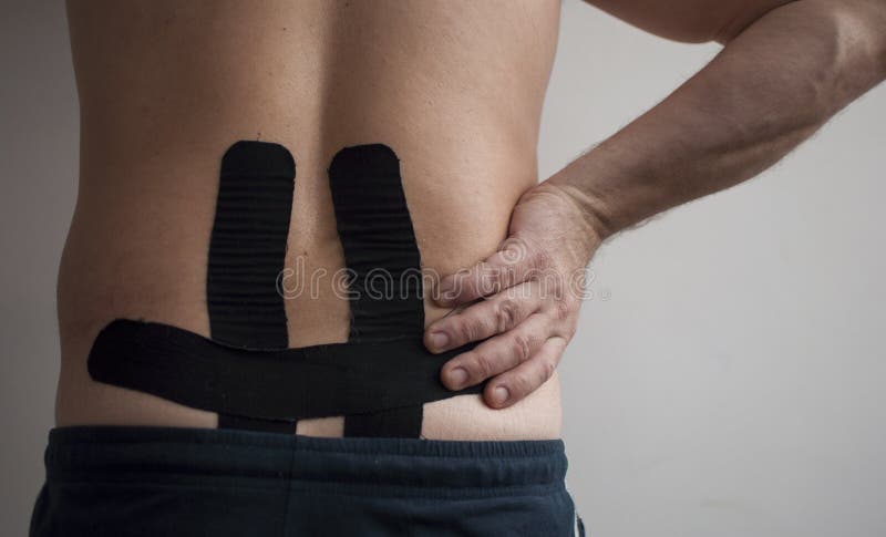 Man with Kinesio Tape on His Back. Back Pain Stock Photo - Image of ...