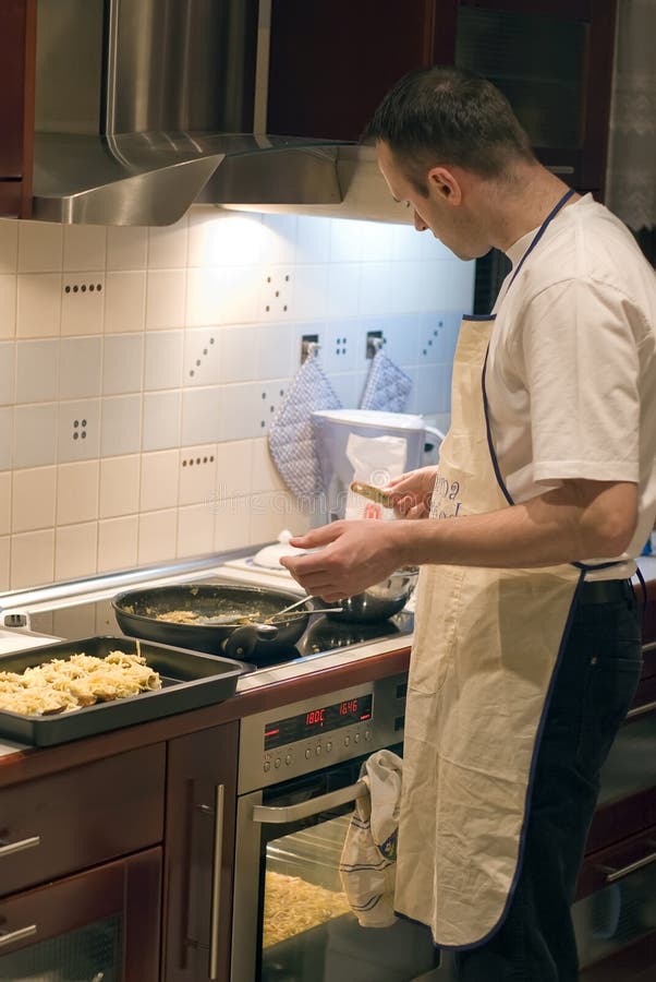 Man in kitchen stock photo. Image of peer, adult, cook - 3977024