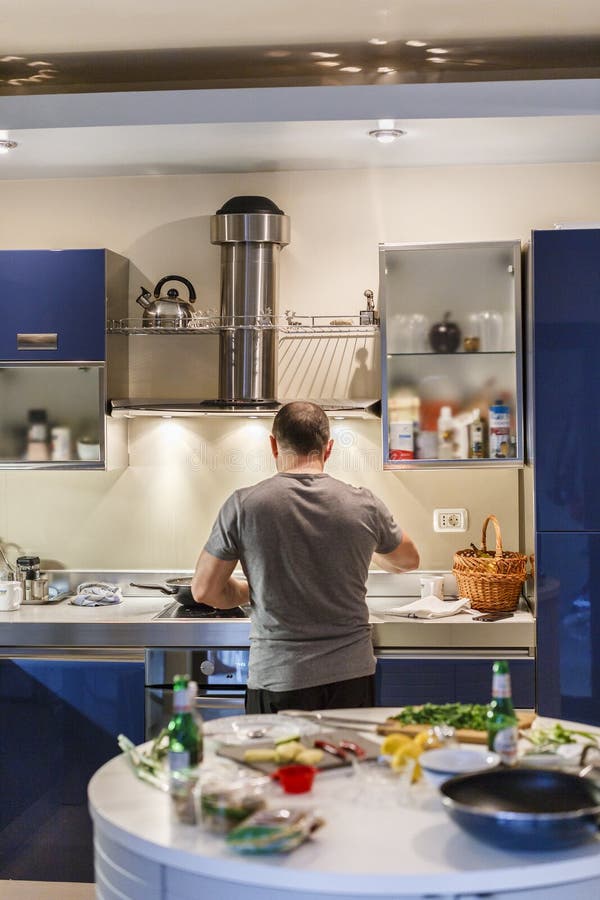Man in the kitchen stock photo. Image of prepared, casual - 68324912