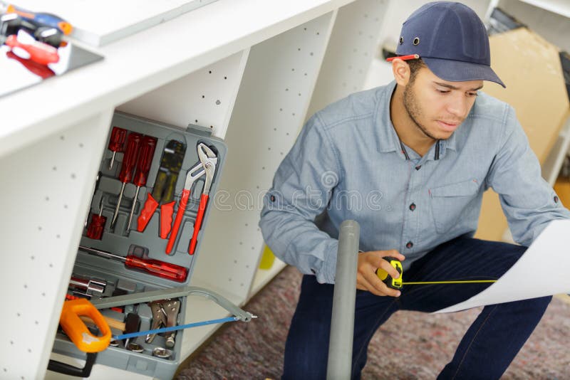 Man and Kitchen Furniture Set Installation Stock Image - Image of house ...
