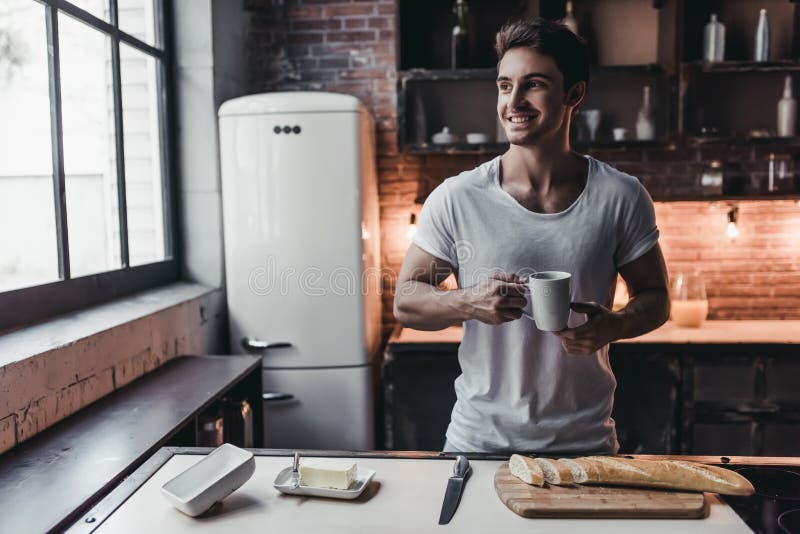 Man on kitchen stock photo. Image of gadget, knife, casual - 96259946