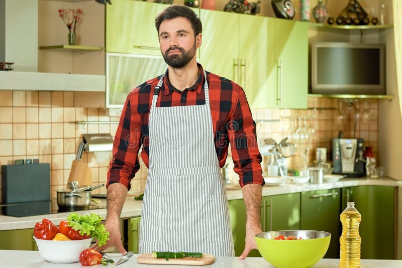 Man in the kitchen. stock photo. Image of lettuce, ingredient - 101891836