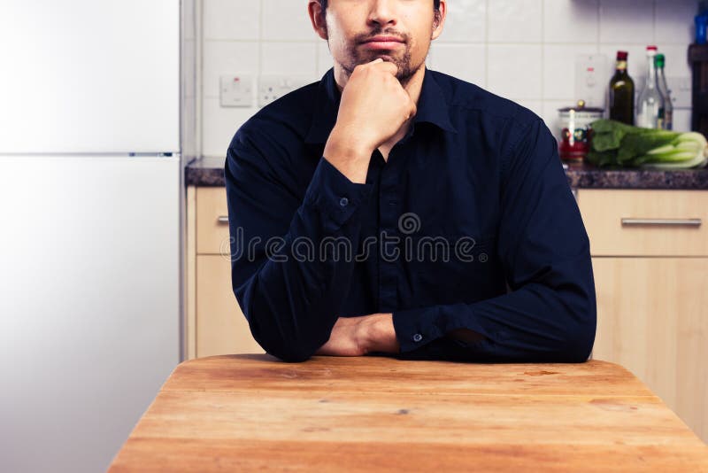 Man in Kitchen is Thinking and Writing Stock Image - Image of hand ...