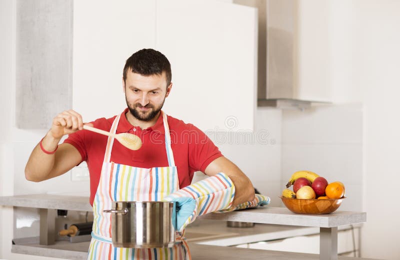 Man in kitchen stock photo. Image of modern, dinner, fruit - 36595690