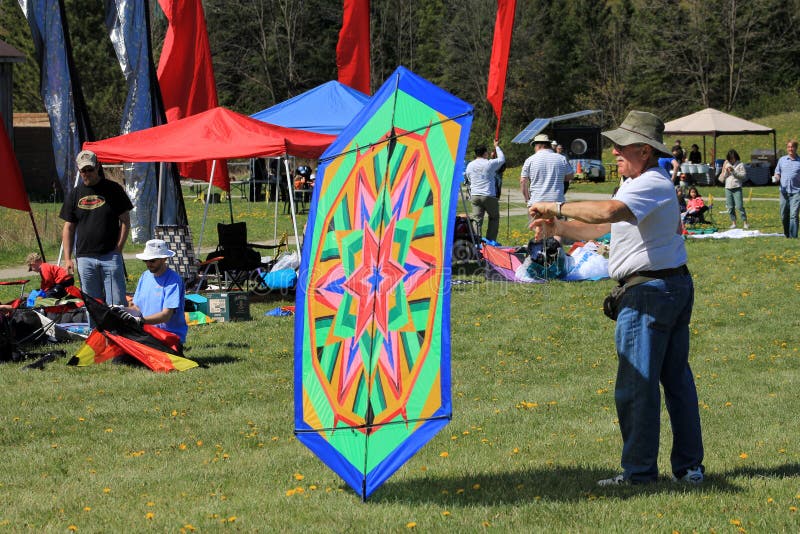 A Man with Kite editorial stock photo. Image of ornament - 24674088