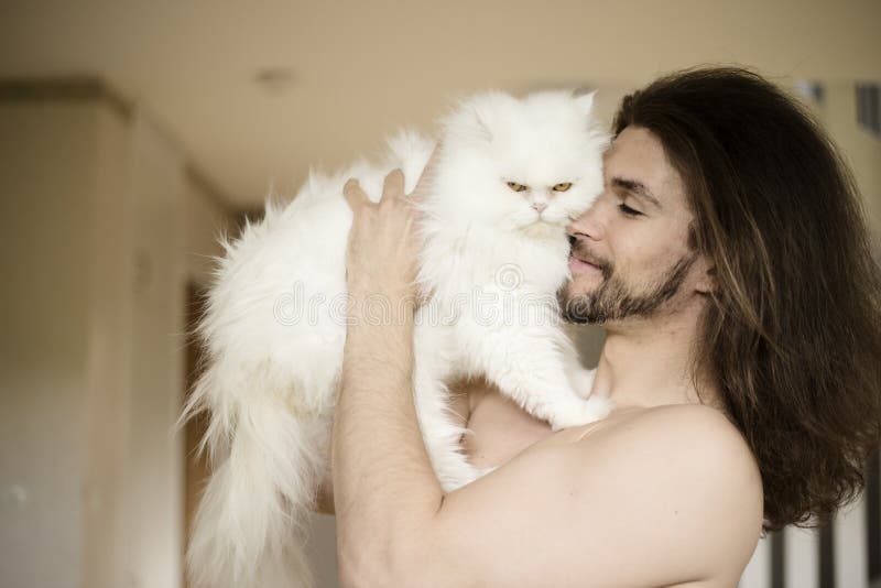 Man and kitty stock photo. Image of confidence, fluffy - 64930308