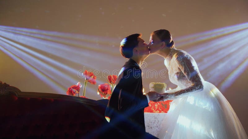 Bride and Groom Kneeling, Happy in Formal Wear at Wedding Event. a ...