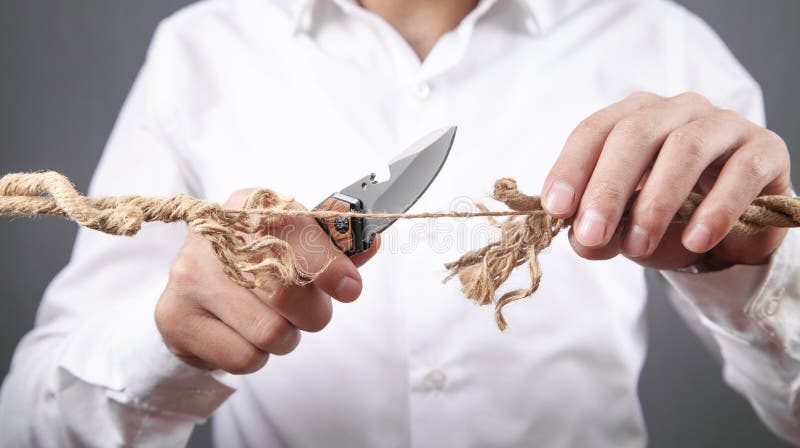Man with Knife Cutting Frayed Rope. Risk Stock Image - Image of risk ...